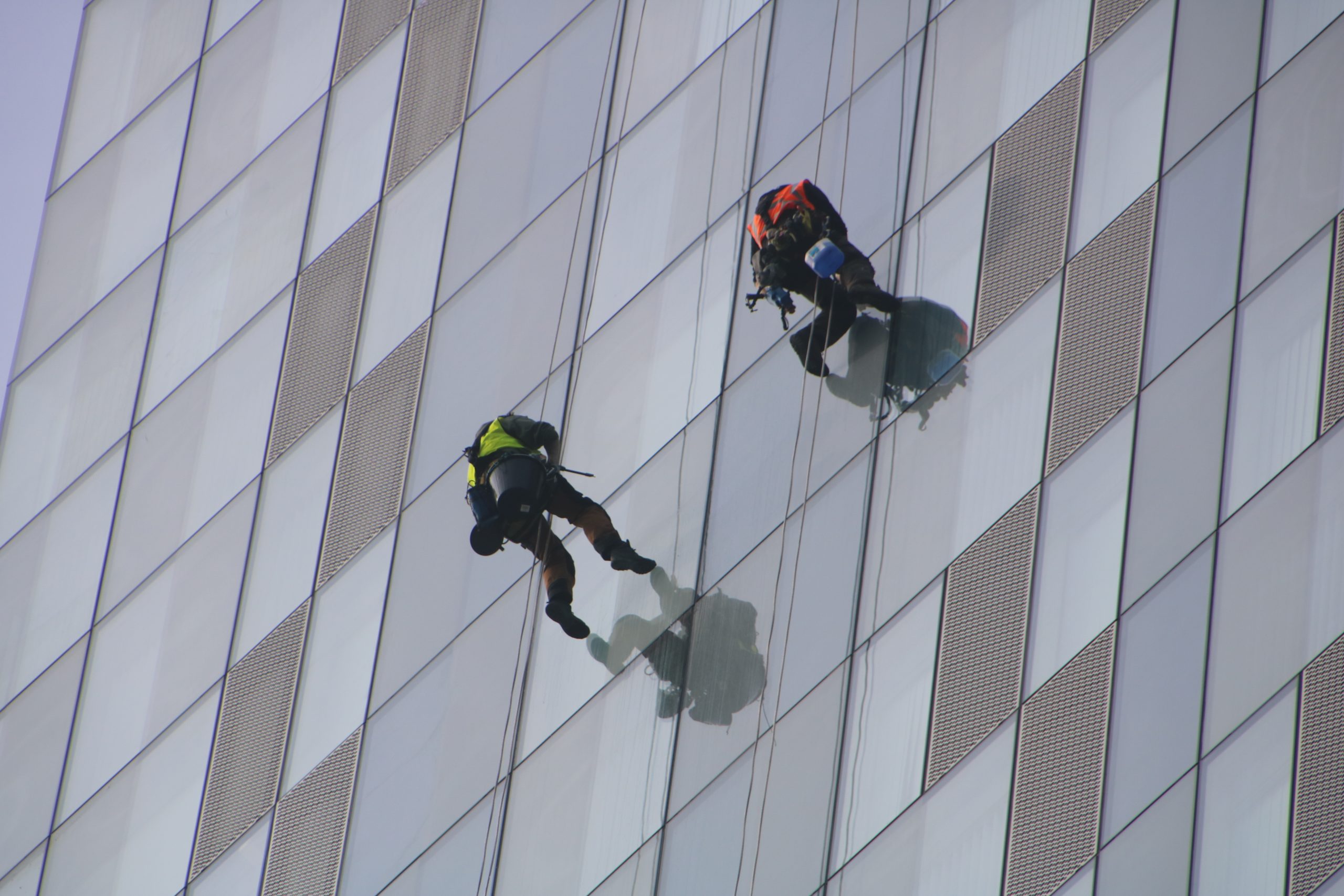 Tower block cladding and window clean | NORTH WEST ROPE ACCESS