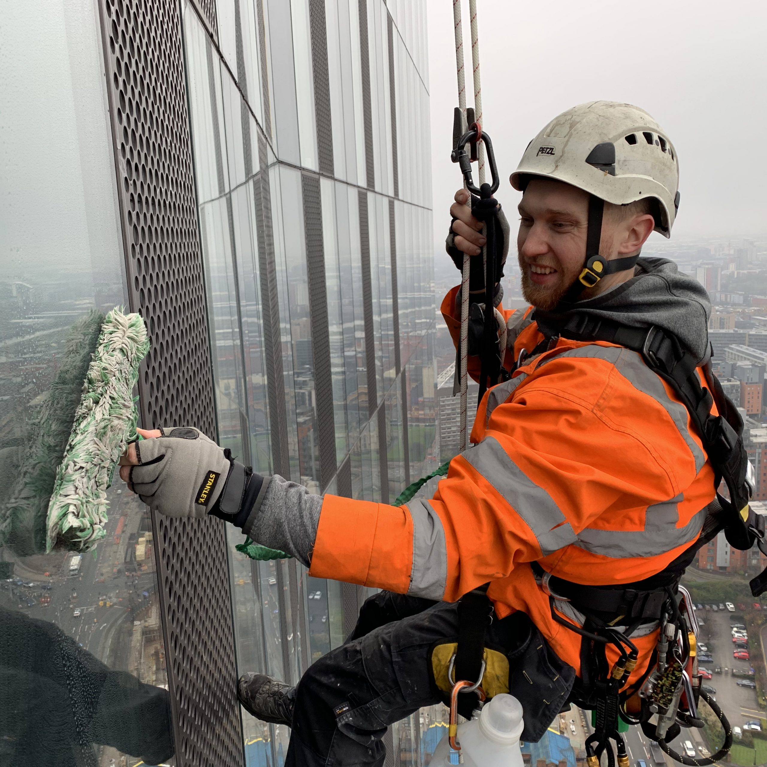 Tower block cladding and window clean | NORTH WEST ROPE ACCESS