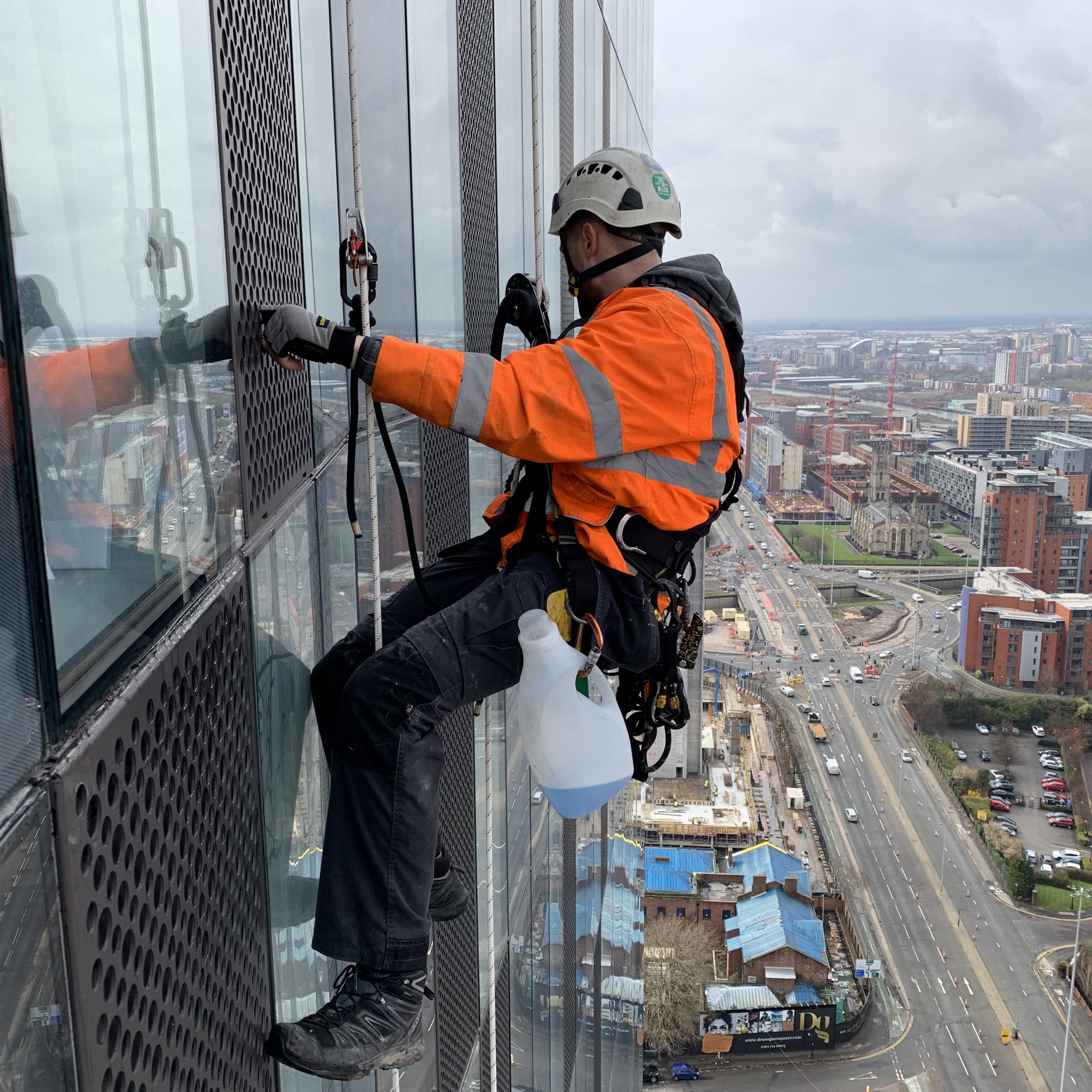 Tower block cladding and window clean | NORTH WEST ROPE ACCESS