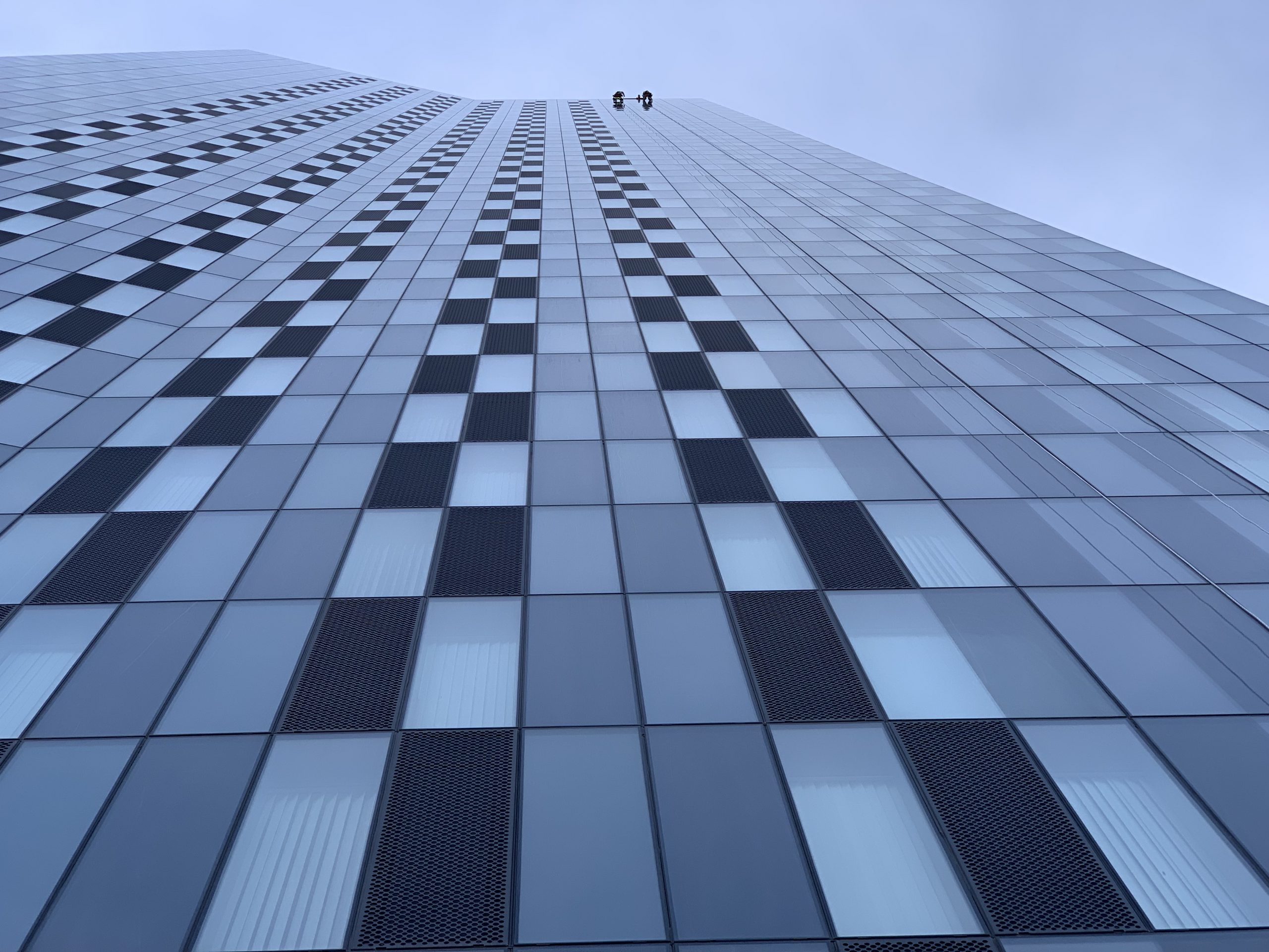 Tower block cladding and window clean | NORTH WEST ROPE ACCESS